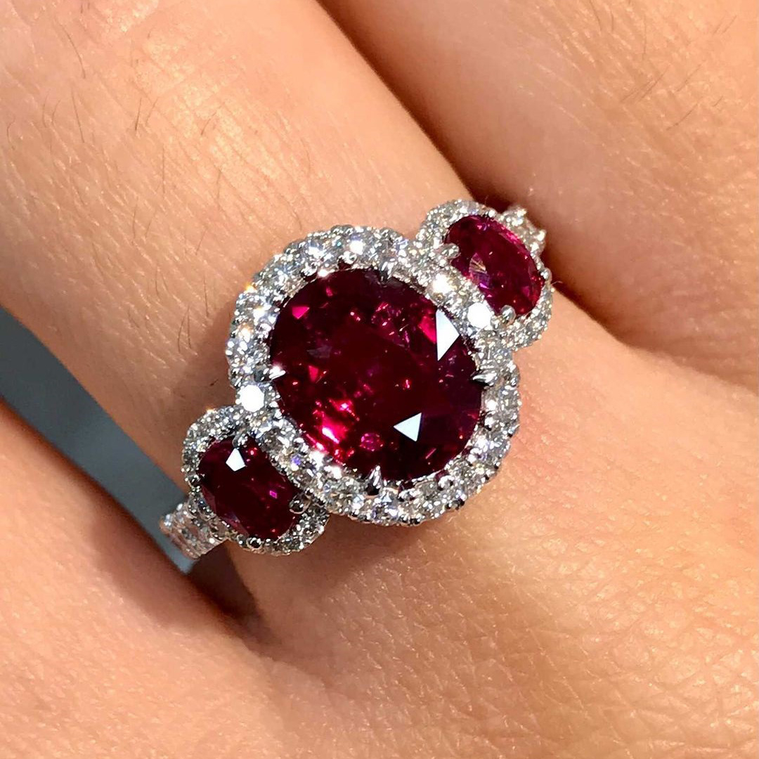 Vintage 3ct Halo Oval Cut Ruby Three Stone Engagement Ring | SayaBling