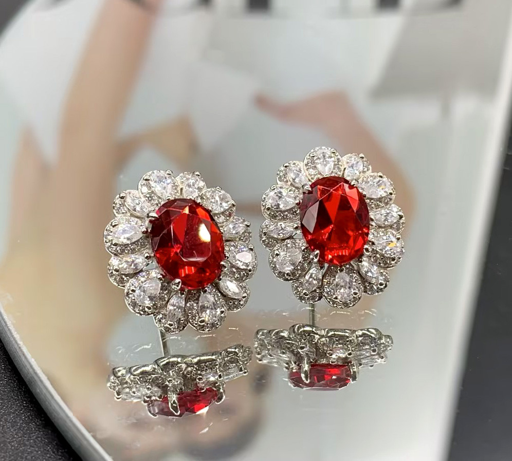 4.35ctw Oval Cut Ruby Stud Earrings | SayaBling