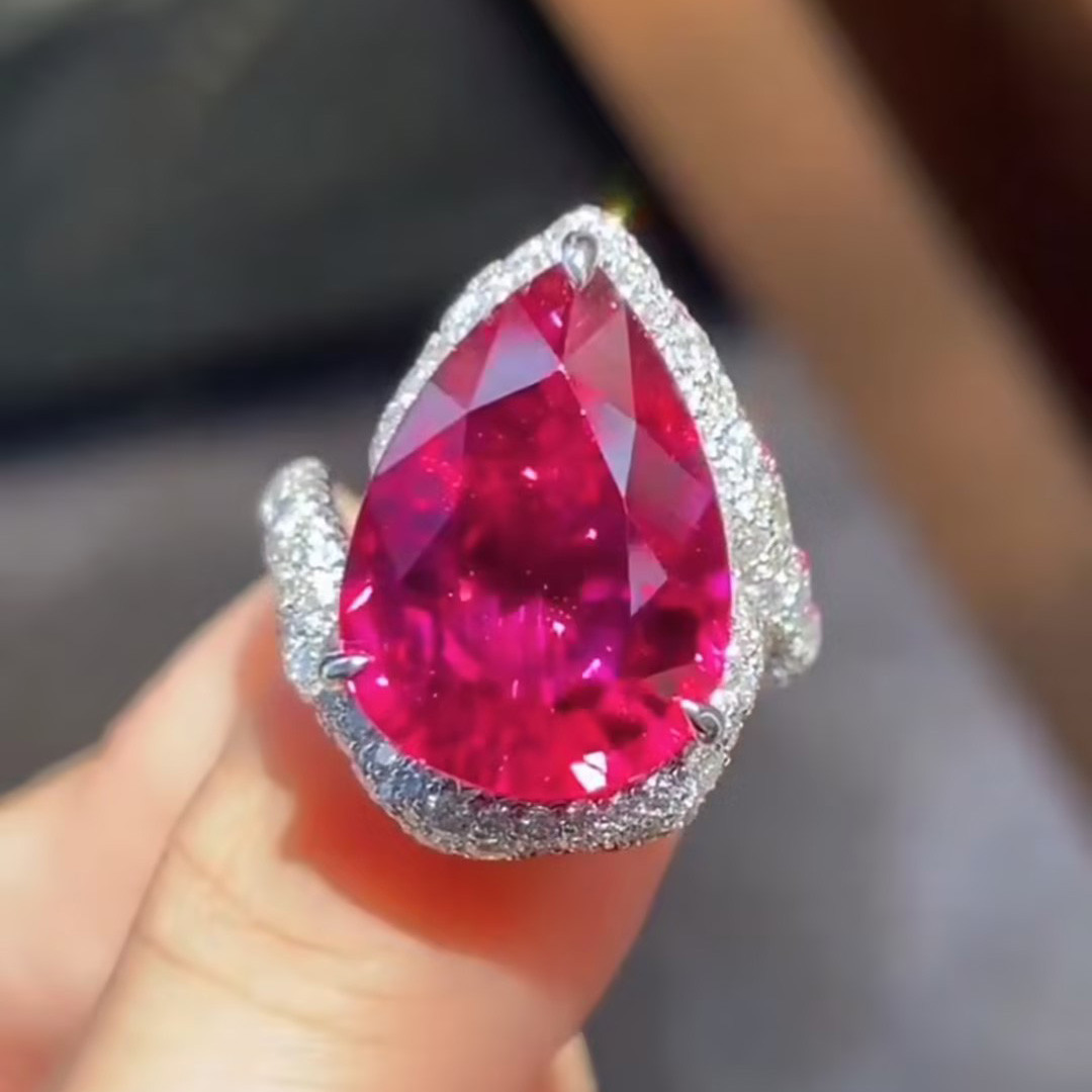 9ct Pear Cut Ruby Bypass Paved Cocktail Ring | SayaBling