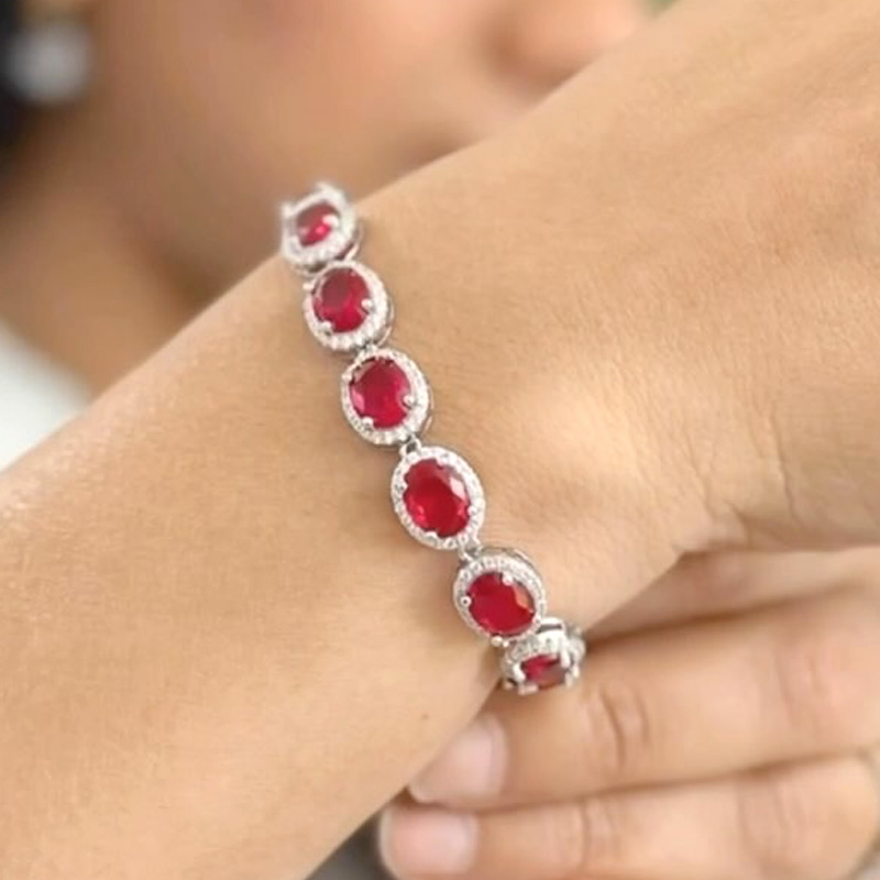 Oval Cut Ruby Bracelet in Sterling Silver | SayaBling
